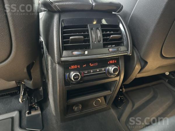 Blue BMW X5 2013 in Riga, with an engine capacity of 3.00 L and mileage of 300 thousand km for 21900 €, photo 10 on AUTOMOTO.COM.LV