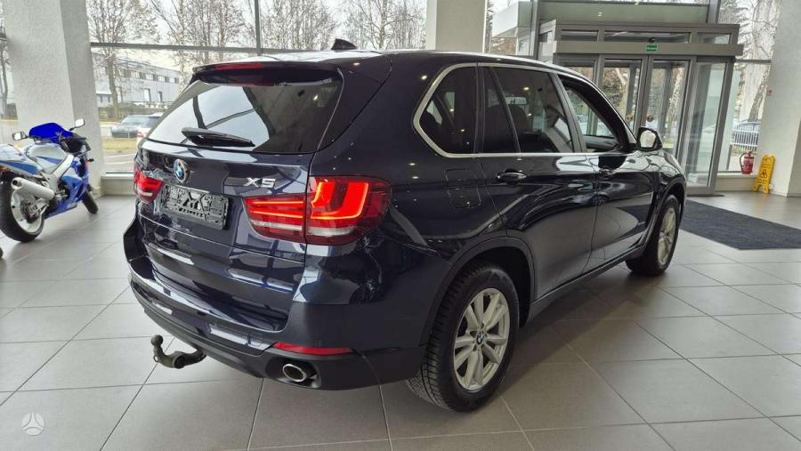 Blue BMW X5 2014 in Marijampole, with an engine capacity of 2.99 L and mileage of 227 thousand km for 19499 €, photo 6 on AUTOMOTO.COM.LV