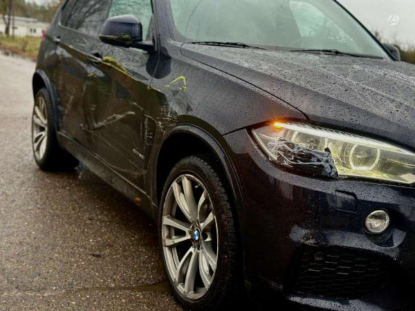 Blue BMW X5 2014 in Vilnius, with an engine capacity of 4.40 L and mileage of 227 thousand km for 12350 €, photo 6 on AUTOMOTO.COM.LV