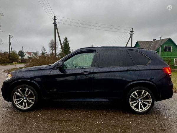 Blue BMW X5 2014 in Vilnius, with an engine capacity of 4.40 L and mileage of 227 thousand km for 12350 €, photo 9 on AUTOMOTO.COM.LV