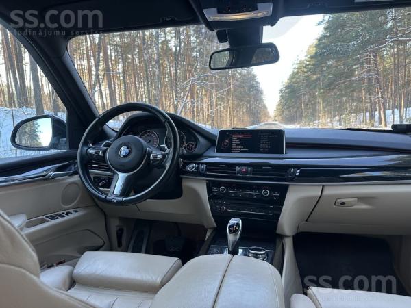 Blue BMW X5 2014 in Riga, with an engine capacity of 3.00 L and mileage of 208 thousand km for 16700 €, photo 7 on AUTOMOTO.COM.LV