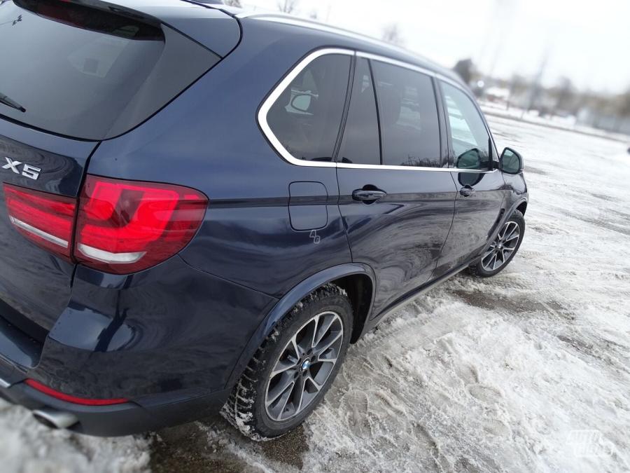Blue BMW X5 2014 in Siauliai, with an engine capacity of 3.00 L and mileage of 300 thousand km for 13800 €, photo 6 on AUTOMOTO.COM.LV