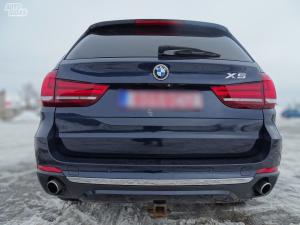 Blue BMW X5 2014 in Siauliai, with an engine capacity of 3.00 L and mileage of 300 thousand km for 13800 €, photo 8 on AUTOMOTO.COM.LV