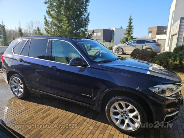 Blue BMW X5 2014 in Tartu, with an engine capacity of 3.00 L and mileage of 228 thousand km for 18790 €, photo 3 on AUTOMOTO.COM.LV