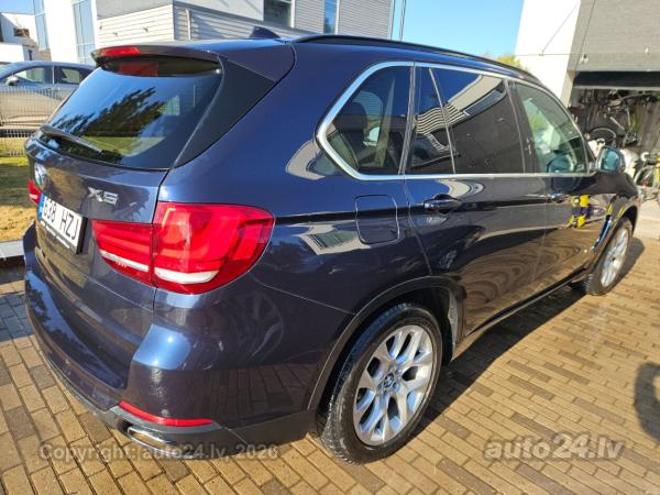 Blue BMW X5 2014 in Tartu, with an engine capacity of 3.00 L and mileage of 228 thousand km for 18790 €, photo 4 on AUTOMOTO.COM.LV
