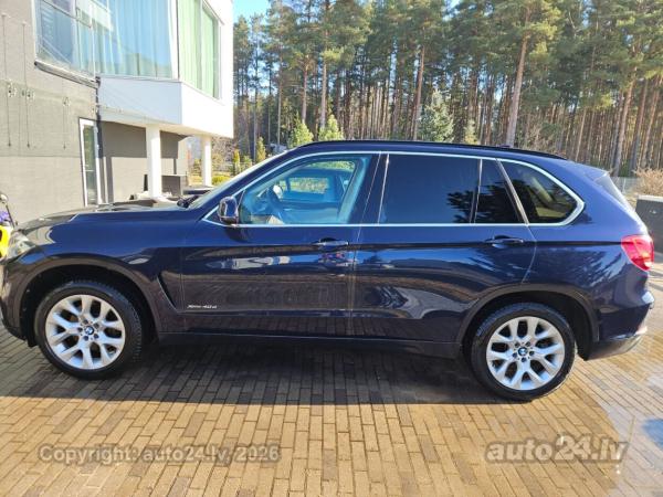 Blue BMW X5 2014 in Tartu, with an engine capacity of 3.00 L and mileage of 228 thousand km for 18790 €, photo 6 on AUTOMOTO.COM.LV