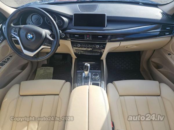 Blue BMW X5 2014 in Tartu, with an engine capacity of 3.00 L and mileage of 228 thousand km for 18790 €, photo 7 on AUTOMOTO.COM.LV