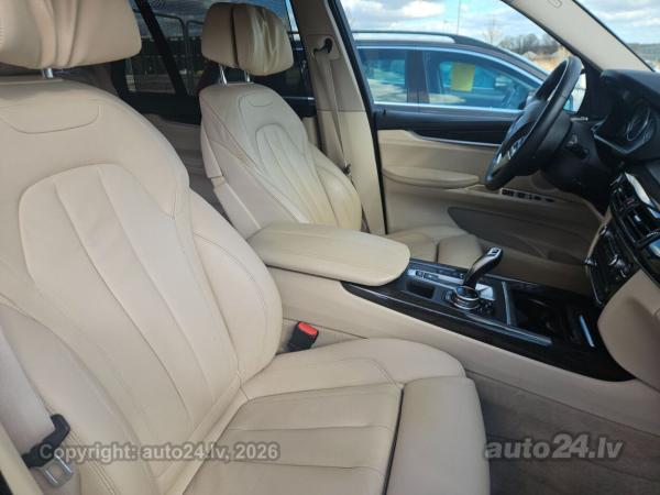 Blue BMW X5 2014 in Tartu, with an engine capacity of 3.00 L and mileage of 228 thousand km for 18790 €, photo 8 on AUTOMOTO.COM.LV