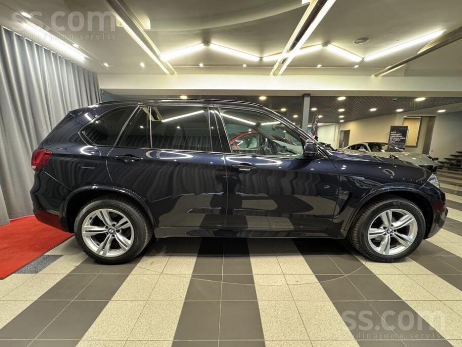 Blue BMW X5 2014 in Riga, with an engine capacity of 3.00 L and mileage of 183 thousand km for 20990 €, photo 5 on AUTOMOTO.COM.LV