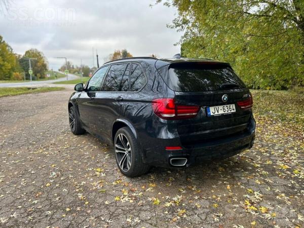 Blue BMW X5 2014 in Saldus, with an engine capacity of 3.00 L and mileage of 273 thousand km for 19500 €, photo 7 on AUTOMOTO.COM.LV