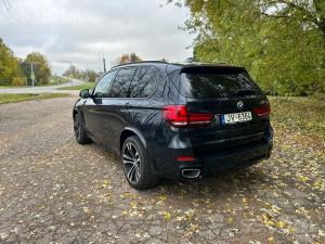 Blue BMW X5 2014 in Saldus, with an engine capacity of 3.00 L and mileage of 273 thousand km for 19500 €, photo 8 on AUTOMOTO.COM.LV