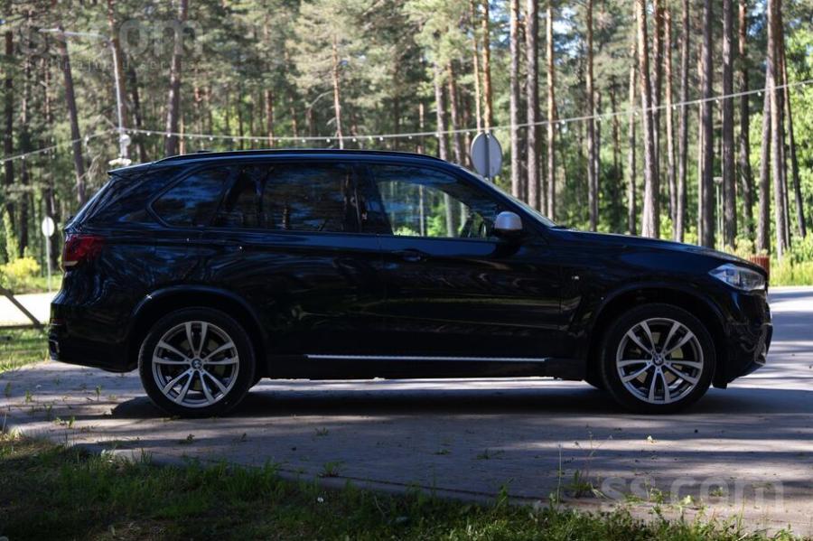 Blue BMW X5 2014 in Riga, with an engine capacity of 3.00 L and mileage of 214 thousand km for 22700 €, photo 9 on AUTOMOTO.COM.LV