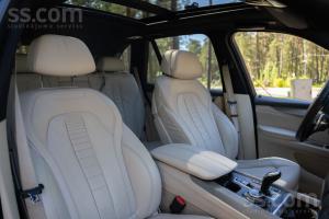 Blue BMW X5 2014 in Riga, with an engine capacity of 3.00 L and mileage of 214 thousand km for 22700 €, photo 16 on AUTOMOTO.COM.LV