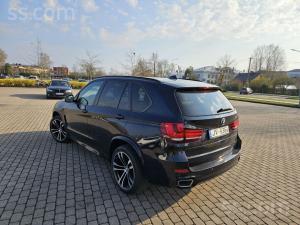 Blue BMW X5 2014 in Saldus, with an engine capacity of 3.00 L and mileage of 265 thousand km for 19800 €, photo 4 on AUTOMOTO.COM.LV
