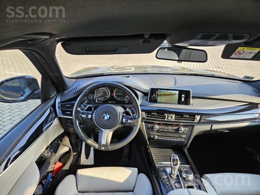 Blue BMW X5 2014 in Saldus, with an engine capacity of 3.00 L and mileage of 265 thousand km for 19800 €, photo 6 on AUTOMOTO.COM.LV