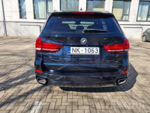 Blue BMW X5 2014 in Riga, with an engine capacity of 3.00 L and mileage of 246 thousand km for 21999 €, photo 6 on AUTOMOTO.COM.LV