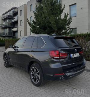 Blue BMW X5 2014 in Jurmala, with an engine capacity of 3.00 L and mileage of 310 thousand km for 19000 €, photo 3 on AUTOMOTO.COM.LV