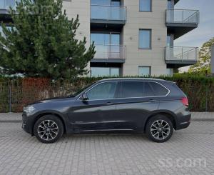 Blue BMW X5 2014 in Jurmala, with an engine capacity of 3.00 L and mileage of 310 thousand km for 19000 €, photo 4 on AUTOMOTO.COM.LV