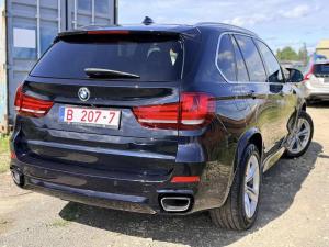 Blue BMW X5 2014 in Riga, with an engine capacity of 2.00 L and mileage of 259 thousand km for 18995 €, photo 5 on AUTOMOTO.COM.LV