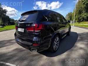 Blue BMW X5 2014 in Riga, with an engine capacity of 3.00 L and mileage of 275 thousand km for 18500 €, photo 4 on AUTOMOTO.COM.LV