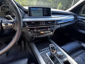 Blue BMW X5 2014 in Riga, with an engine capacity of 3.00 L and mileage of 275 thousand km for 18500 €, photo 7 on AUTOMOTO.COM.LV