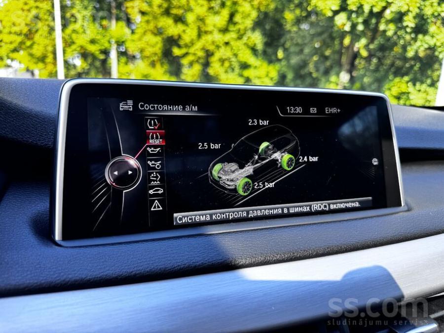 Blue BMW X5 2014 in Riga, with an engine capacity of 3.00 L and mileage of 275 thousand km for 18500 €, photo 12 on AUTOMOTO.COM.LV