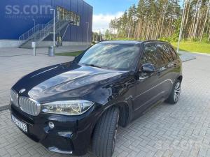 Blue BMW X5 2015 in Riga, with an engine capacity of 3.00 L and mileage of 213 thousand km for 20999 €, photo 5 on AUTOMOTO.COM.LV