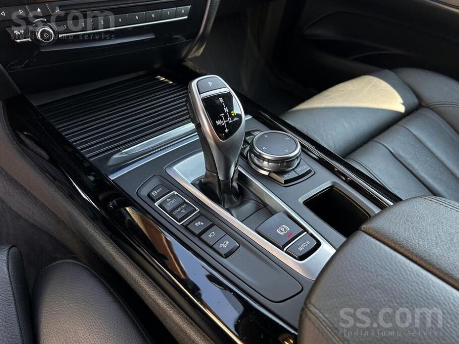 Blue BMW X5 2015 in Riga, with an engine capacity of 3.00 L and mileage of 242 thousand km for 23499 €, photo 4 on AUTOMOTO.COM.LV