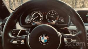 Blue BMW X5 2015 in Bauska, with an engine capacity of 3.00 L and mileage of 207 thousand km for 22500 €, photo 12 on AUTOMOTO.COM.LV
