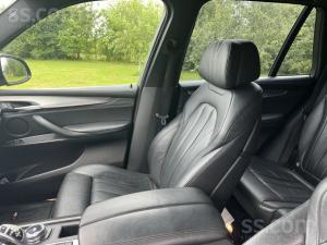 Blue BMW X5 2015 in Bauska, with an engine capacity of 3.00 L and mileage of 207 thousand km for 22500 €, photo 13 on AUTOMOTO.COM.LV