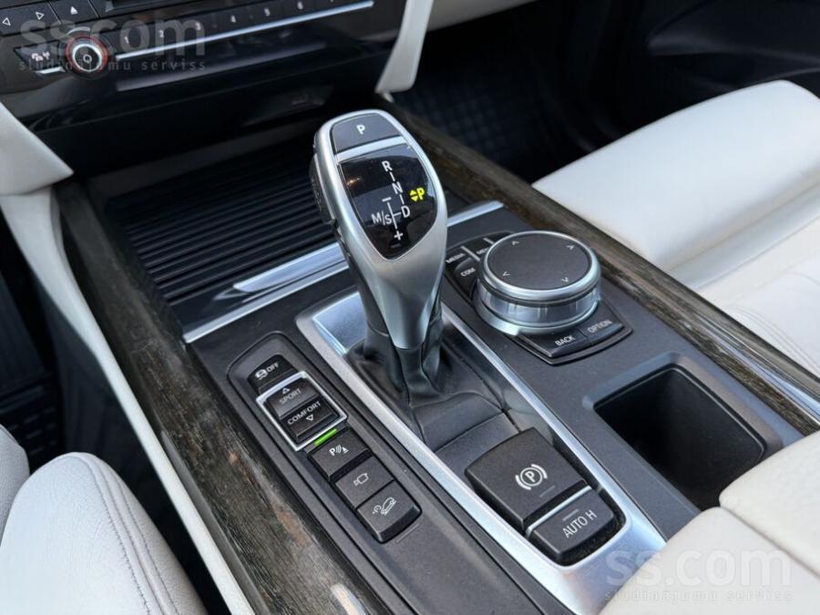 Blue BMW X5 2017 in Riga, with an engine capacity of 3.00 L and mileage of 190 thousand km for 21400 €, photo 25 on AUTOMOTO.COM.LV