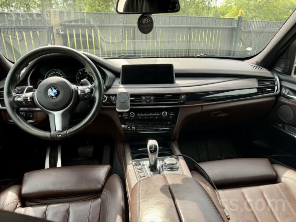 Blue BMW X5 2017 in Riga, with an engine capacity of 3.00 L and mileage of 167 thousand km for 25900 €, photo 1 on AUTOMOTO.COM.LV