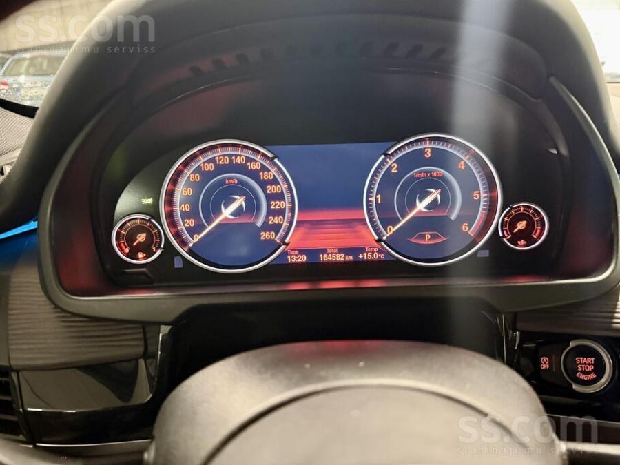 Blue BMW X5 2017 in Riga, with an engine capacity of 3.00 L and mileage of 167 thousand km for 25900 €, photo 8 on AUTOMOTO.COM.LV
