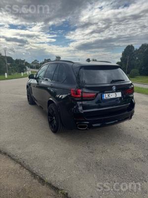 Blue BMW X5 2018 in Aizkraukle, with an engine capacity of 3.00 L and mileage of 219 thousand km for 23500 €, photo 5 on AUTOMOTO.COM.LV