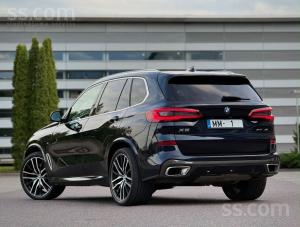 Blue BMW X5 2019 in Aluksne, with an engine capacity of 3.00 L and mileage of 200 thousand km for 32500 €, photo 7 on AUTOMOTO.COM.LV
