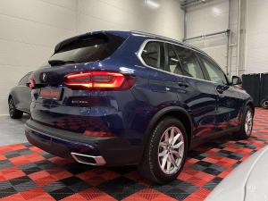 Blue BMW X5 2021 in Vilnius, with an engine capacity of 3.00 L and mileage of 77 thousand km for 44990 €, photo 4 on AUTOMOTO.COM.LV