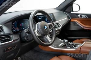 Blue BMW X5 2021 in Riga, with an engine capacity of 3.00 L and mileage of 90 thousand km for 48500 €, photo 30 on AUTOMOTO.COM.LV