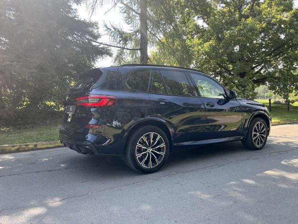 Blue BMW X5 2022 in Panevezys, with an engine capacity of 3.00 L and mileage of 143 thousand km for 42250 €, photo 5 on AUTOMOTO.COM.LV