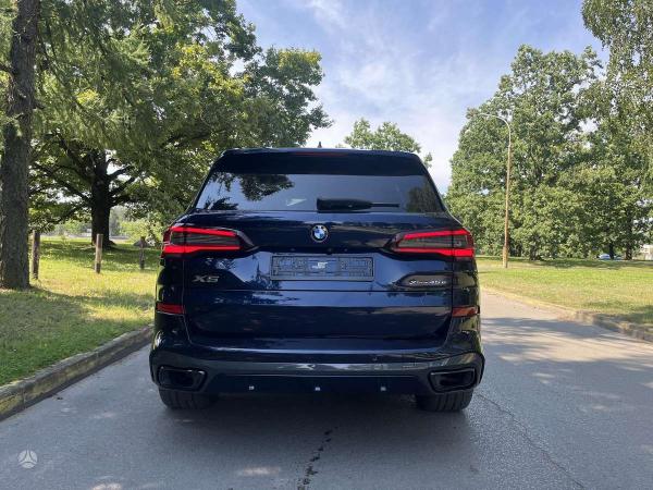 Blue BMW X5 2022 in Panevezys, with an engine capacity of 3.00 L and mileage of 143 thousand km for 42250 €, photo 6 on AUTOMOTO.COM.LV