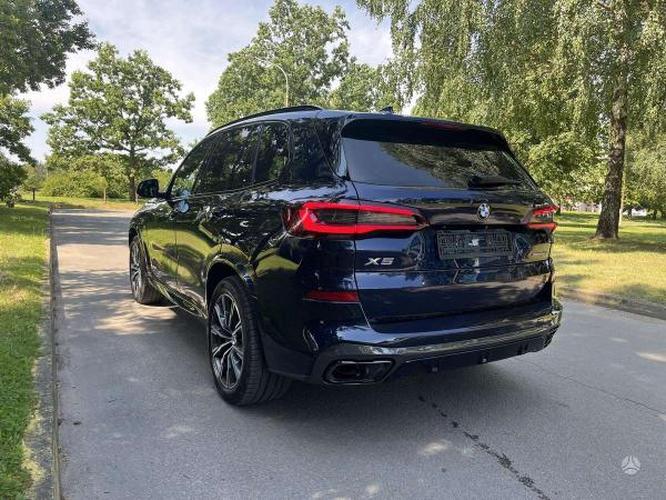 Blue BMW X5 2022 in Panevezys, with an engine capacity of 3.00 L and mileage of 143 thousand km for 42250 €, photo 7 on AUTOMOTO.COM.LV