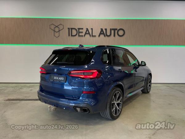 Blue BMW X5 2021 in Tallinn, with an engine capacity of 2.99 L and mileage of 90 thousand km for 52890 €, photo 4 on AUTOMOTO.COM.LV