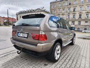 Brown BMW X5 2005 in Riga, with an engine capacity of 4.40 L and mileage of 0 thousand km for 5500 €, photo 4 on AUTOMOTO.COM.LV