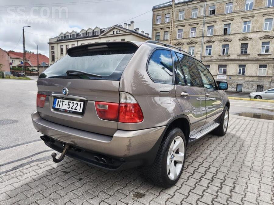 Brown BMW X5 2005 in Riga, with an engine capacity of 4.40 L and mileage of 0 thousand km for 5500 €, photo 4 on AUTOMOTO.COM.LV