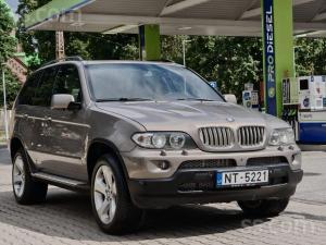 Brown BMW X5 2005 in Riga, with an engine capacity of 4.40 L and mileage of 0 thousand km for 5500 €, photo 12 on AUTOMOTO.COM.LV