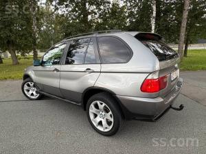 Brown BMW X5 2005 in Riga, with an engine capacity of 3.00 L and mileage of 0 thousand km for 4490 €, photo 3 on AUTOMOTO.COM.LV