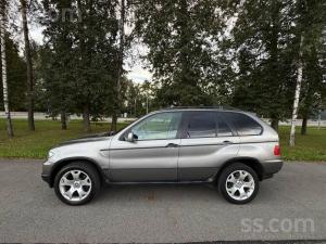 Brown BMW X5 2005 in Riga, with an engine capacity of 3.00 L and mileage of 0 thousand km for 4490 €, photo 5 on AUTOMOTO.COM.LV