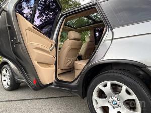 Brown BMW X5 2005 in Riga, with an engine capacity of 3.00 L and mileage of 0 thousand km for 4490 €, photo 14 on AUTOMOTO.COM.LV