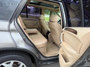 Brown BMW X5 2005 in Riga, with an engine capacity of 3.00 L and mileage of 0 thousand km for 4490 €, photo 19 on AUTOMOTO.COM.LV
