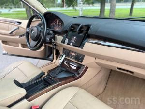 Brown BMW X5 2005 in Riga, with an engine capacity of 3.00 L and mileage of 0 thousand km for 4490 €, photo 23 on AUTOMOTO.COM.LV