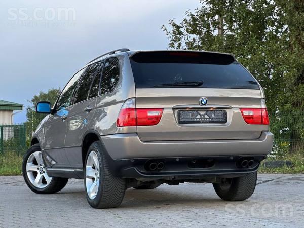 Brown BMW X5 2006 in Riga, with an engine capacity of 4.40 L and mileage of 0 thousand km for 6950 €, photo 2 on AUTOMOTO.COM.LV